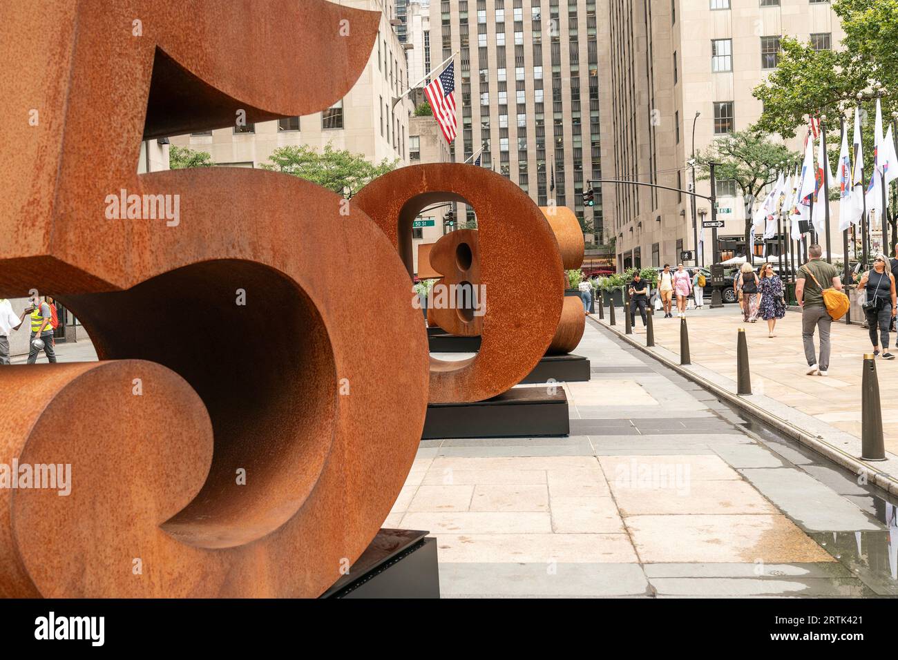 New York, USA. 13th Sep, 2023. People walk, take photos of art ...