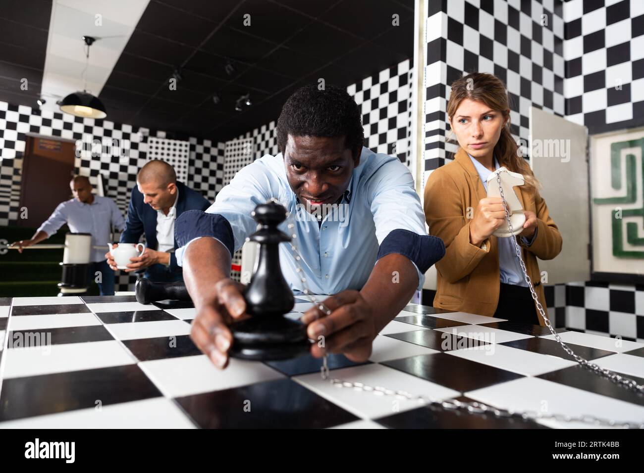 Adult female friends playing chess hi-res stock photography and images ...