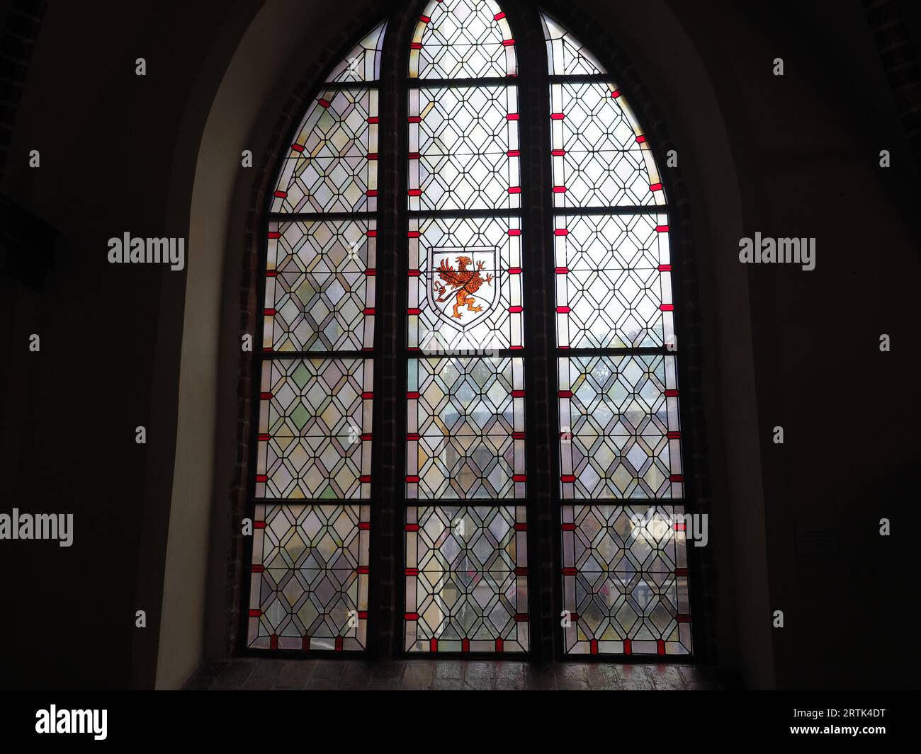 The stained glass window of Darlowo Castle Stock Photo - Alamy