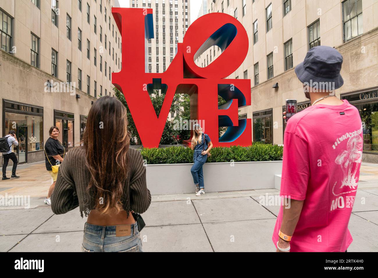 New York, USA. 13th Sep, 2023. People walk, take photos of art ...