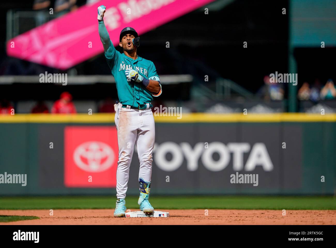 Seattle Mariners' Julio Rodriguez celebrates hitting an RBI double to ...