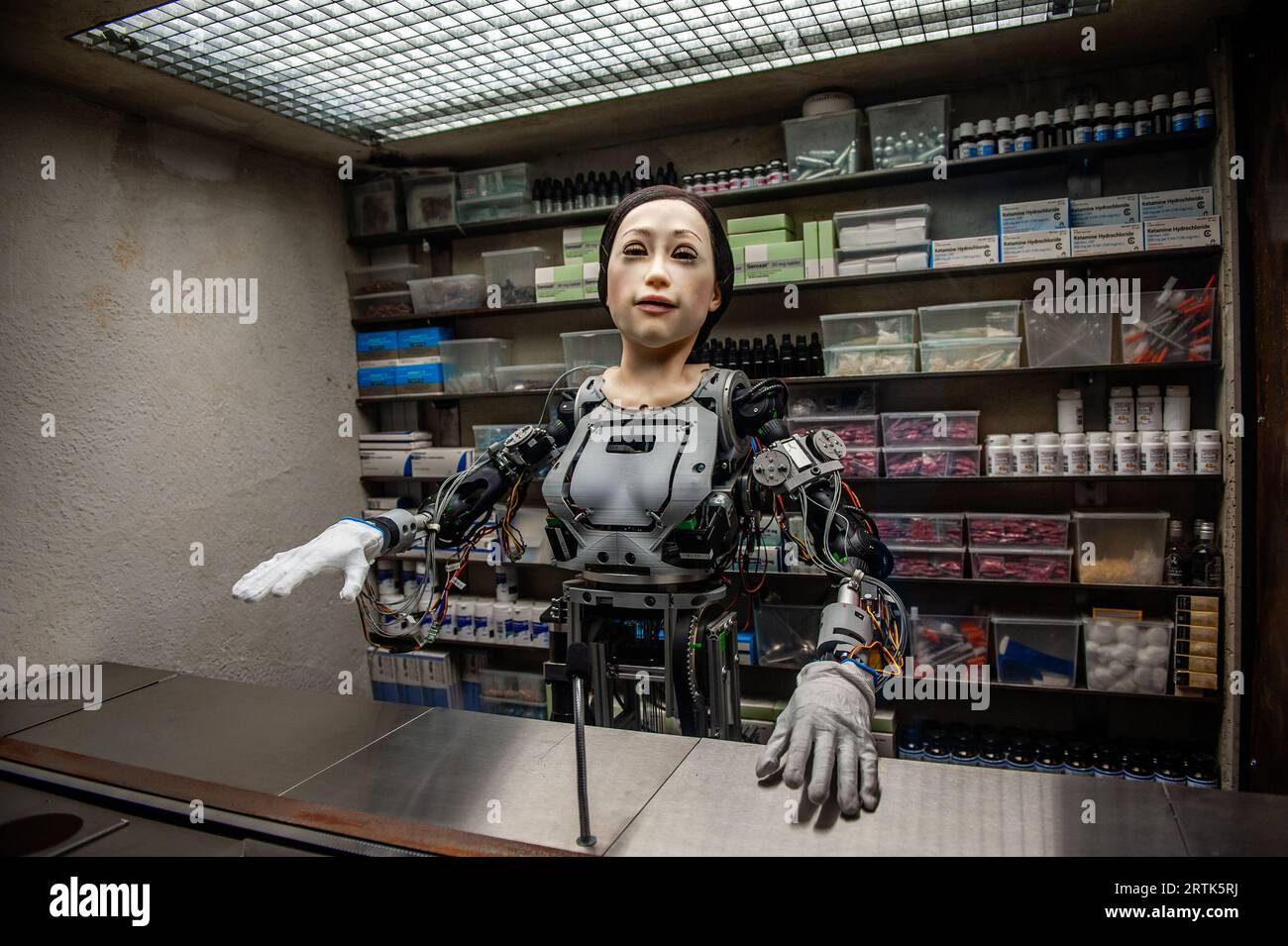 A human-looking robot is seen selling fake medicaments to be happier ...