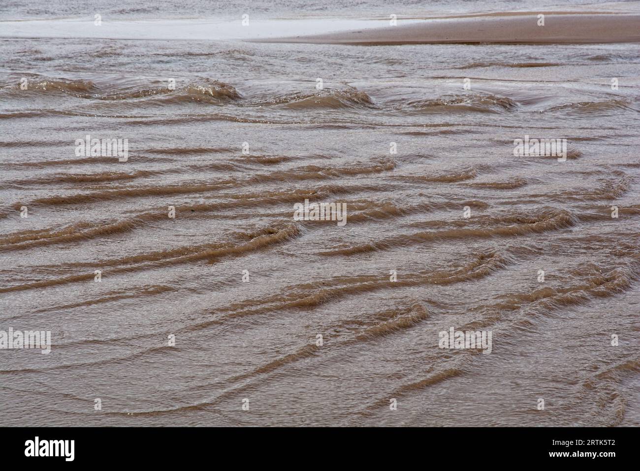 Close up of surge flow over sand ridges in Medano creek bed at Great ...