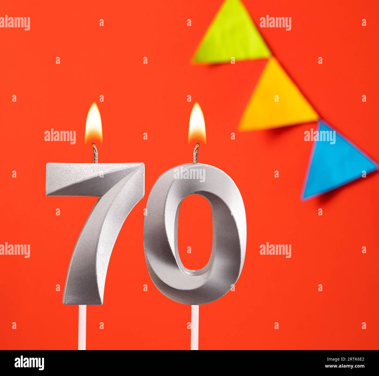 Birthday card - Number 70 candle in orange background Stock Photo - Alamy