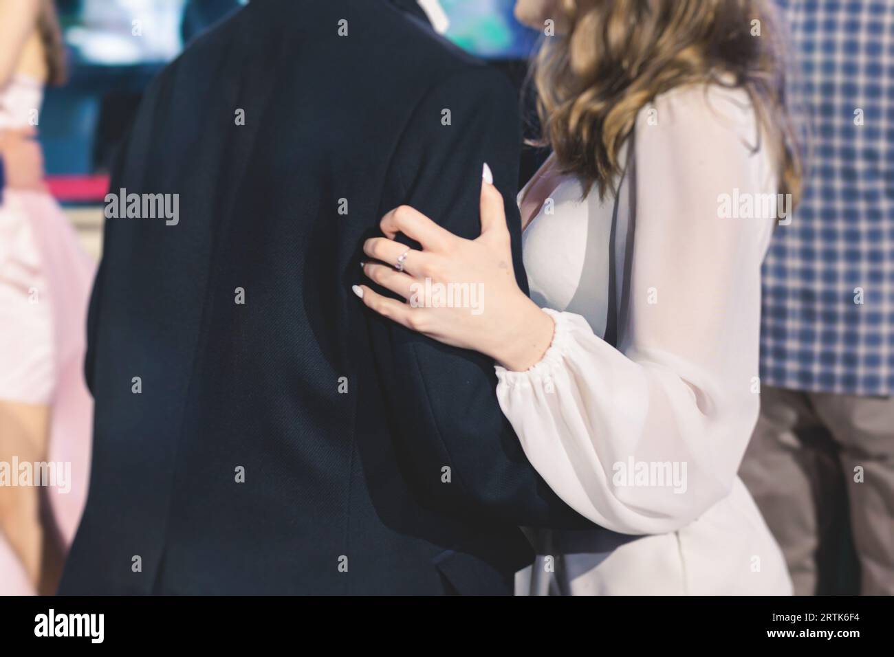 High school graduates dancing waltz and classical ball dance in dresses ...