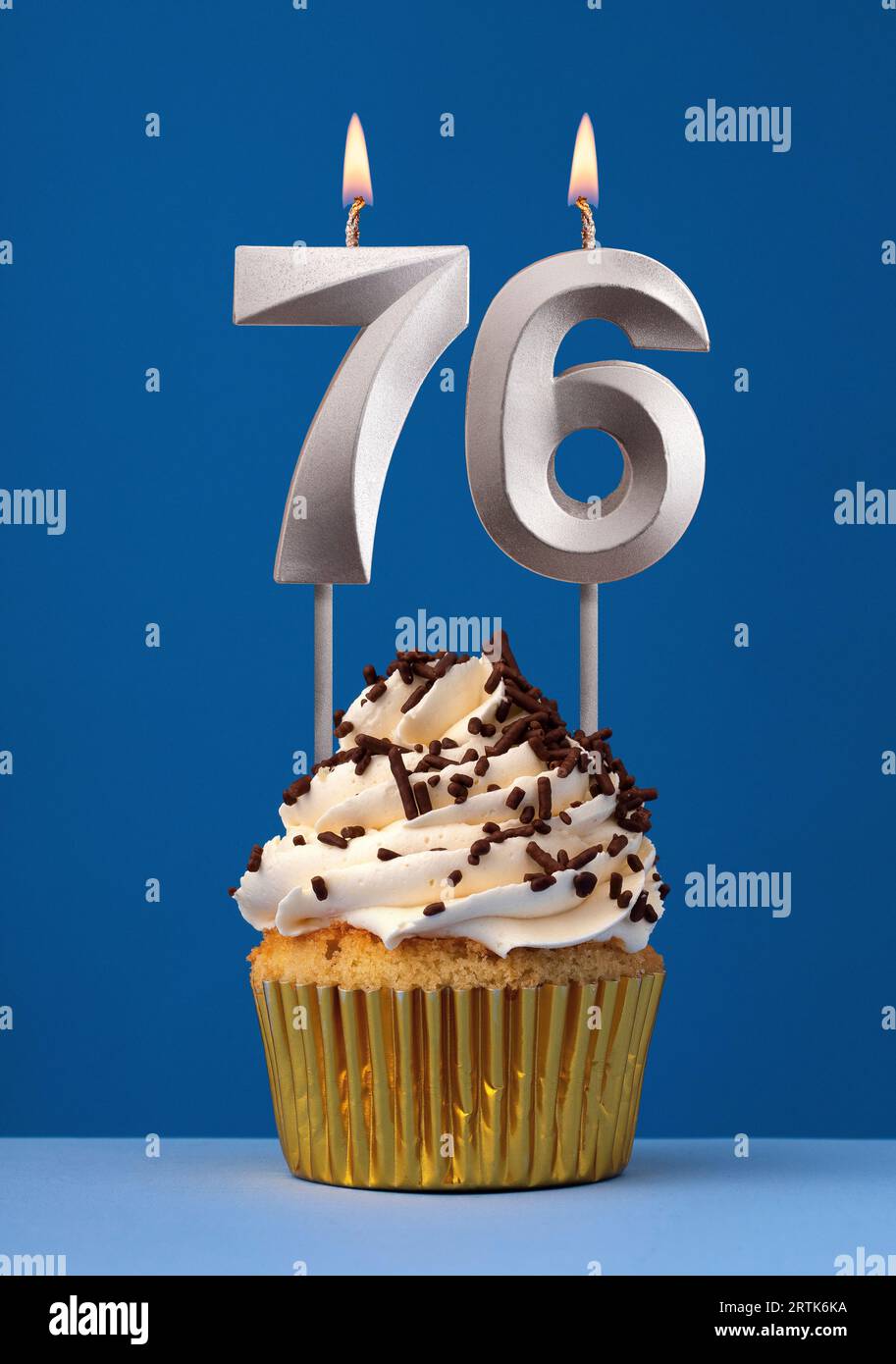 Vertical birthday card with cake - Lit candle number 76 on blue ...