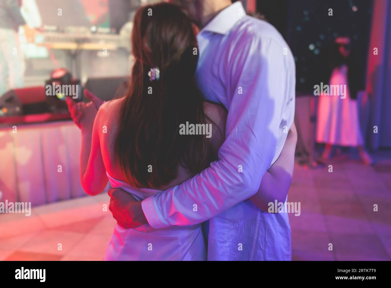 High school graduates dancing waltz and classical ball dance in dresses ...