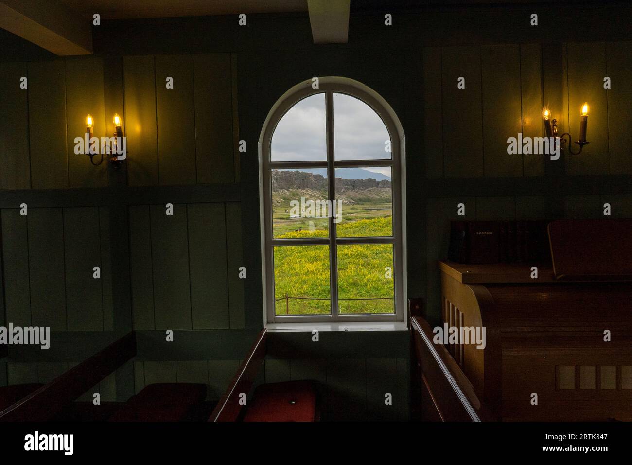 Window with view of country within the little parish church of ...