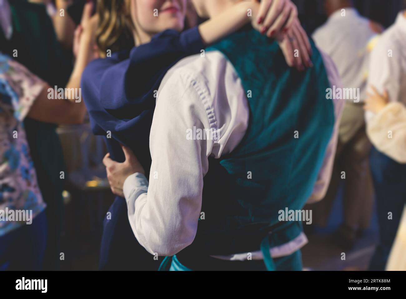 High school graduates dancing waltz and classical ball dance in dresses ...