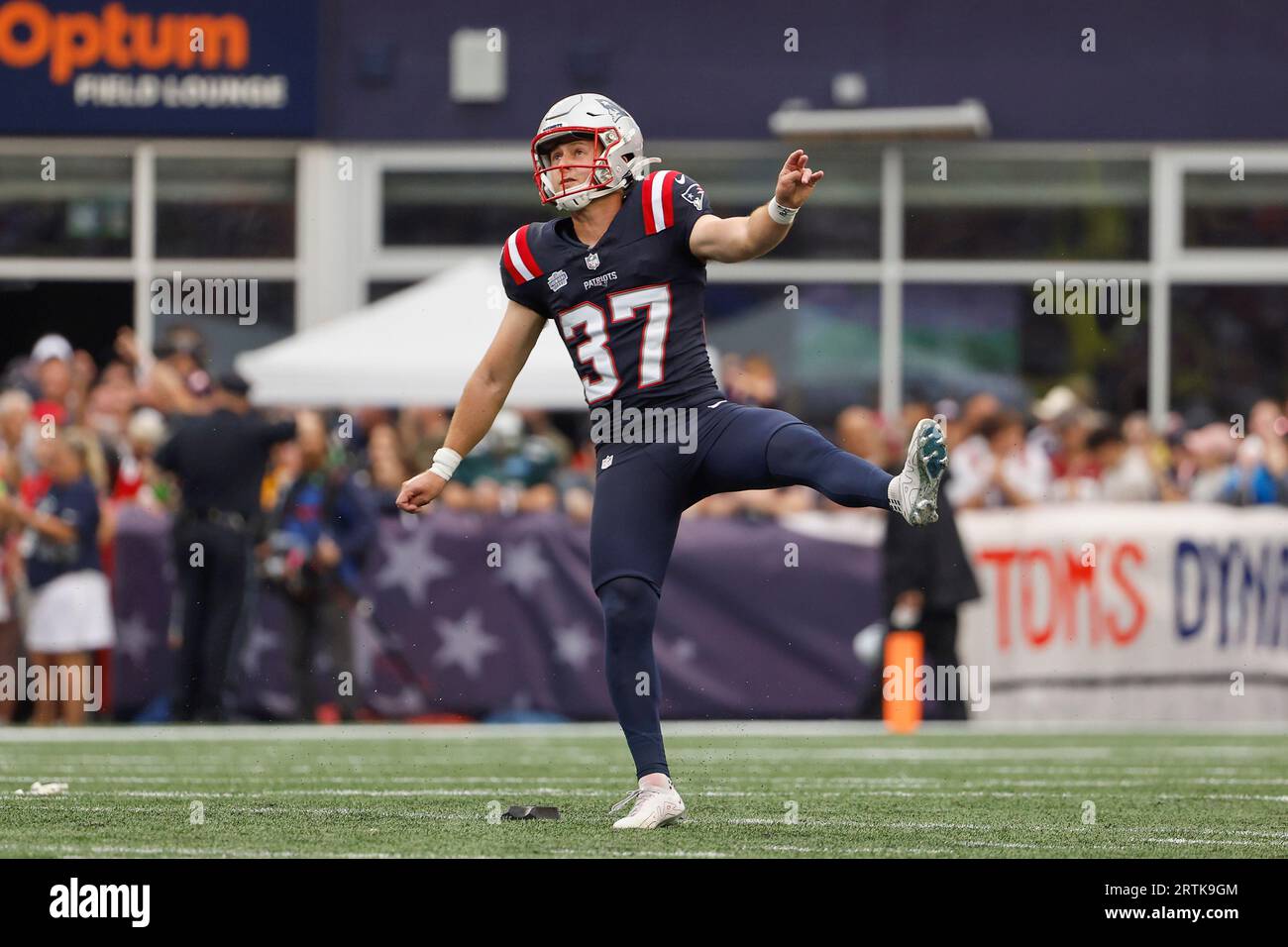 New England Patriots kicker Chad Ryland watches his kick-off against ...