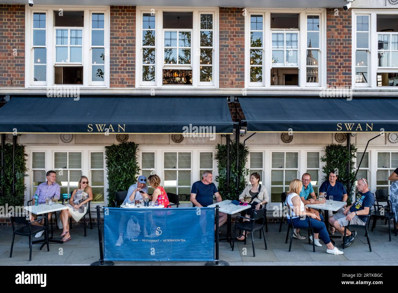 Customers Sitting Outside The Swan Bar/Restaurant, Bankside, London, UK ...