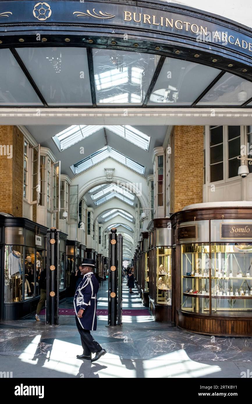 A Beadle Dressed In Traditional Costume Stands At The Entrance Of ...