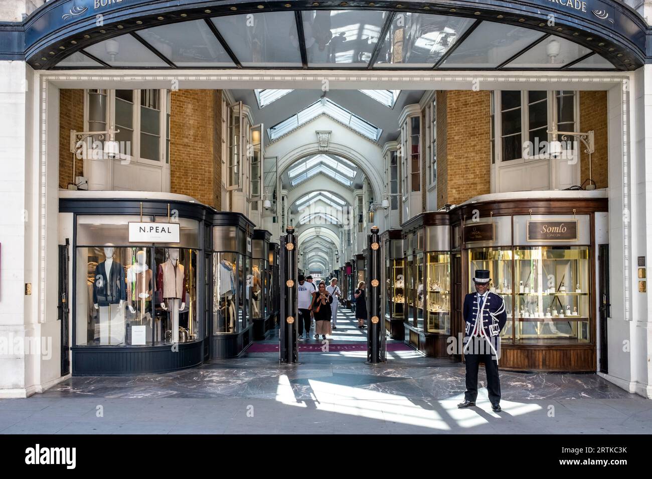 A Beadle Dressed In Traditional Costume Stands At The Entrance Of ...