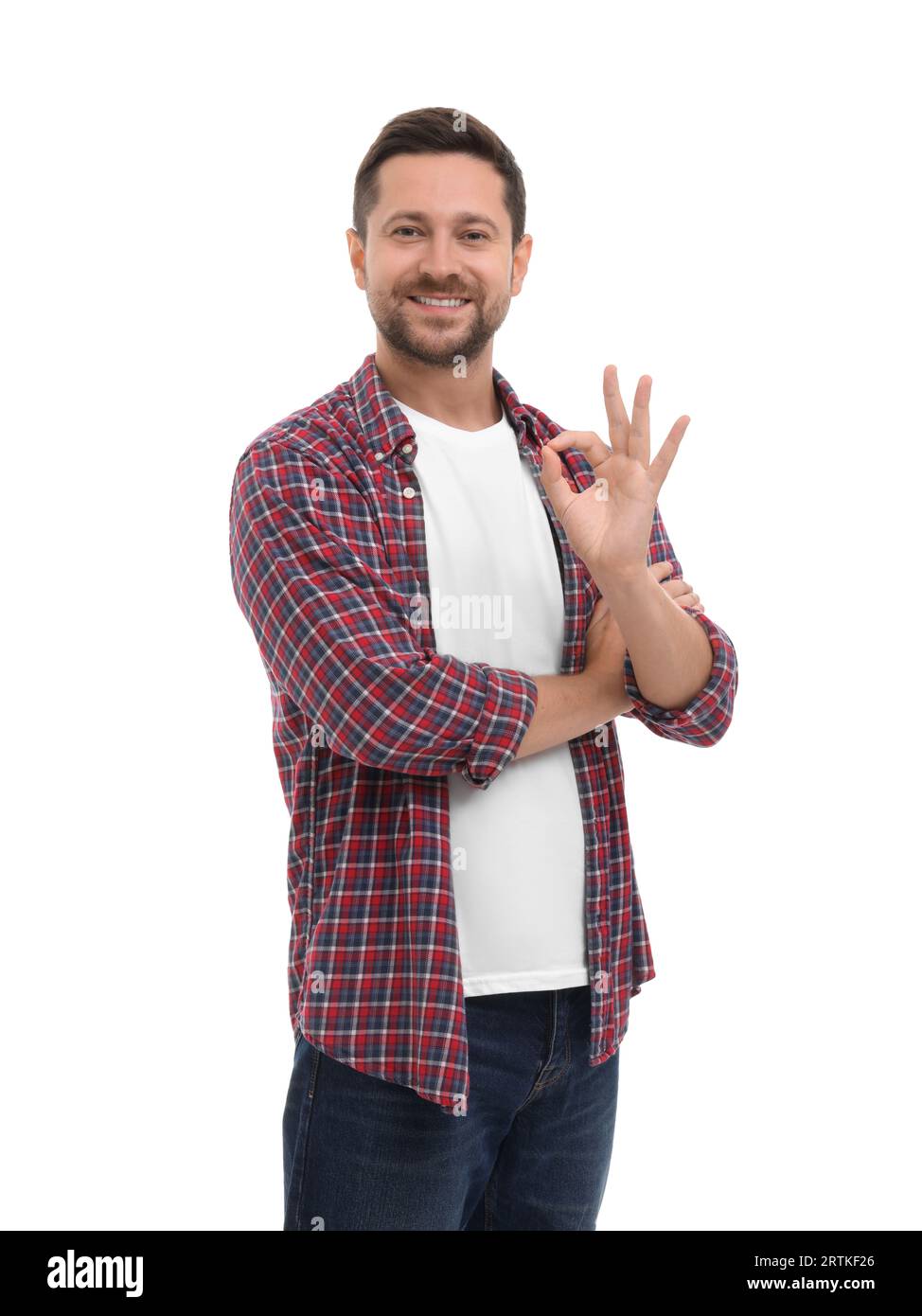 Happy man showing ok gesture on white background Stock Photo - Alamy
