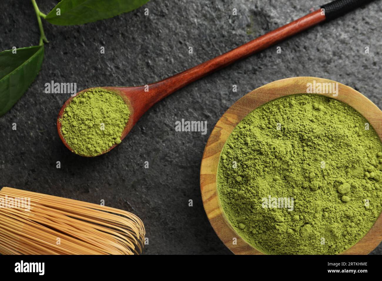 Flat lay composition with green matcha powder on grey table Stock Photo ...