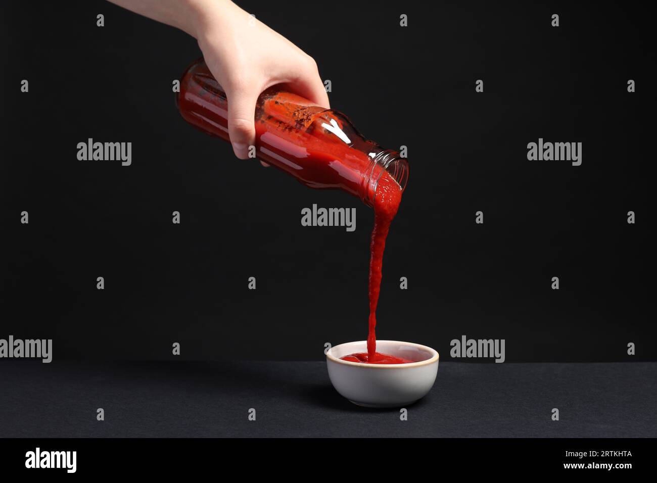 Ketchup pouring from bottle hi-res stock photography and images - Alamy