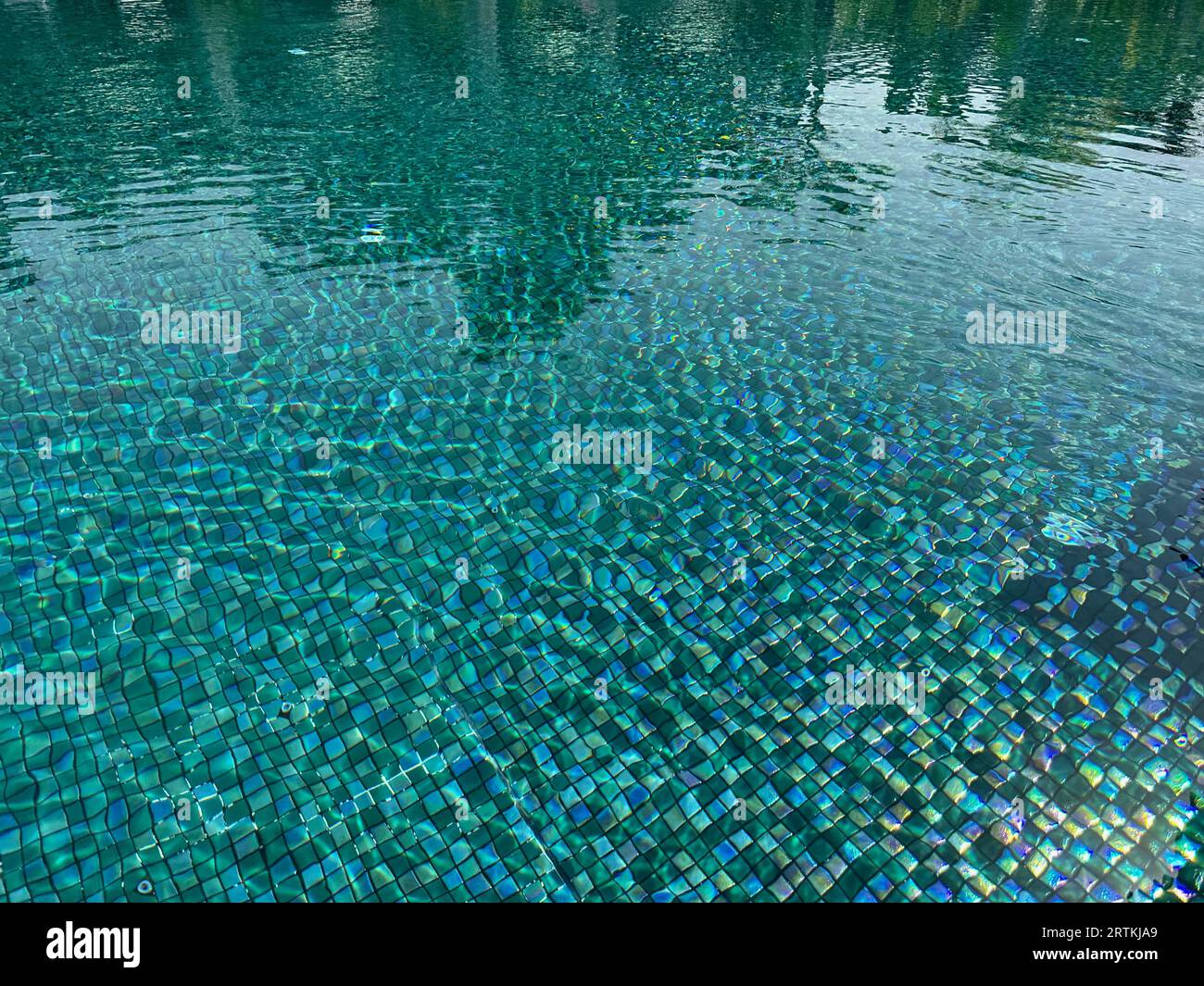 Clear rippled water in swimming pool outdoors Stock Photo - Alamy