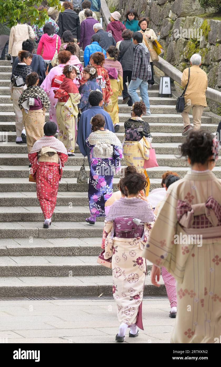 Japanese women in Kimonos climbing the stairways to the Otowa-san ...