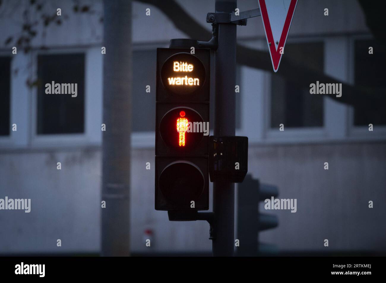 Picture of a traffic light for pedestrians, showing red light, thus ...
