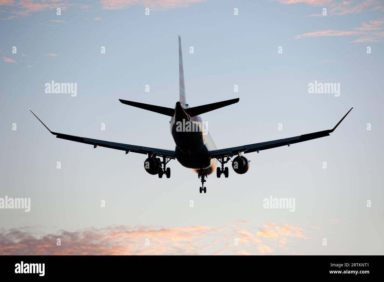 Plane with landing gear down approaching LAX airport in Los Angeles ...