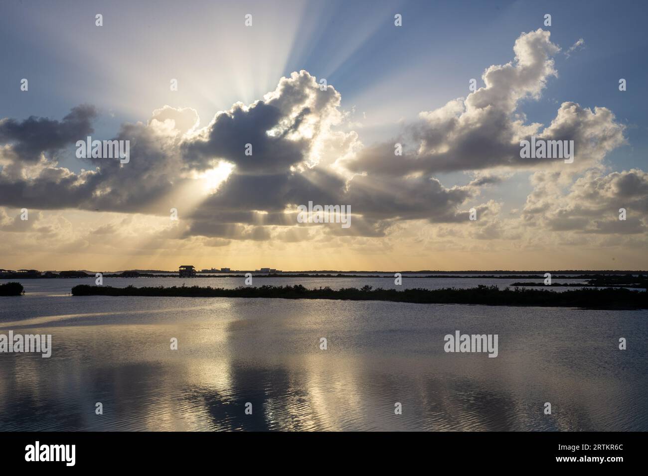 Light rays through clouds looking angelic Stock Photo - Alamy