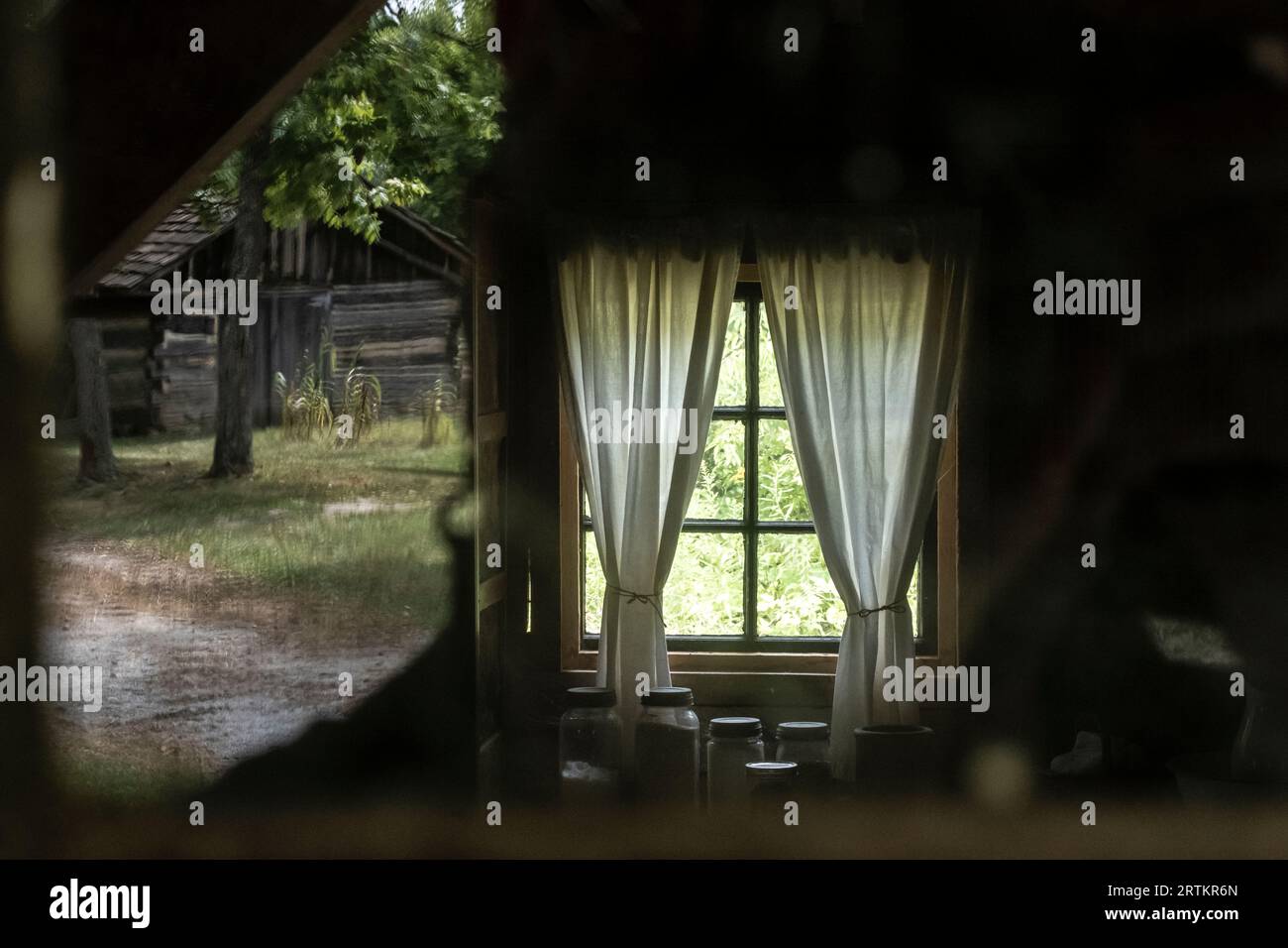 Kitchen window in a 19th-century American log cabin Stock Photo - Alamy