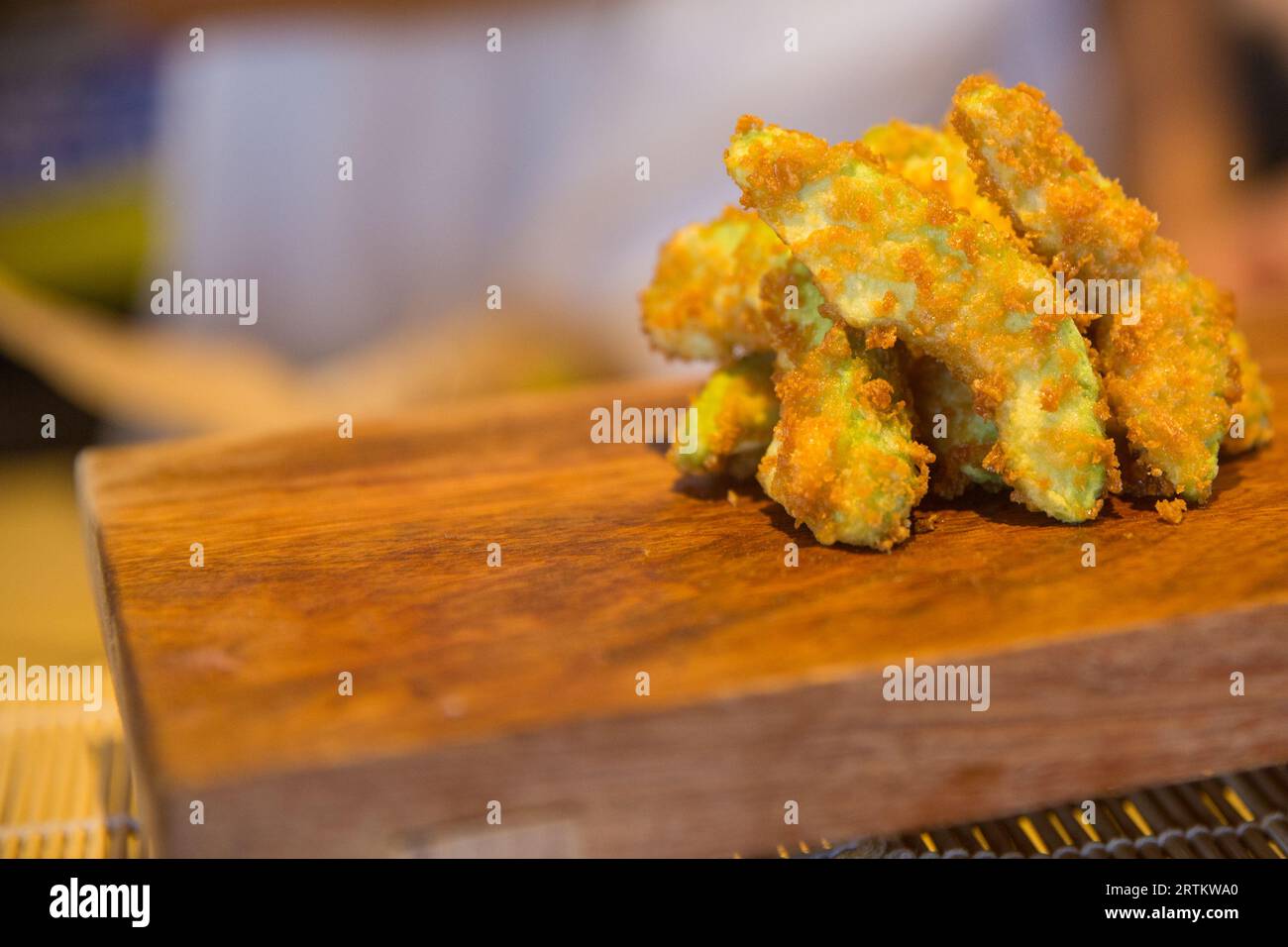 Fried Panko Avocado freshly made Stock Photo - Alamy