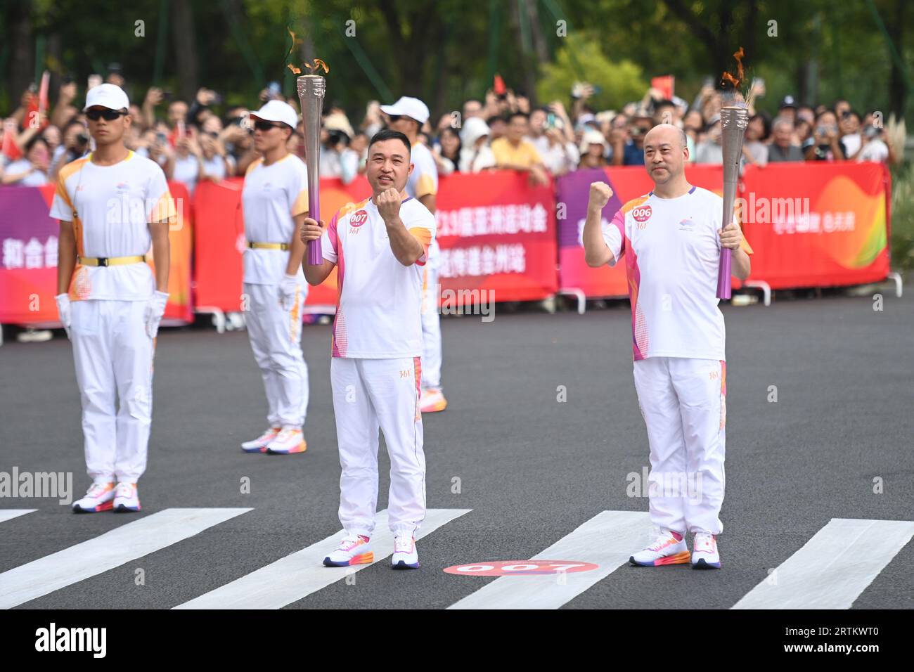 Taizhou, China's Zhejiang Province. 14th Sep, 2023. Torch bearers Yang ...