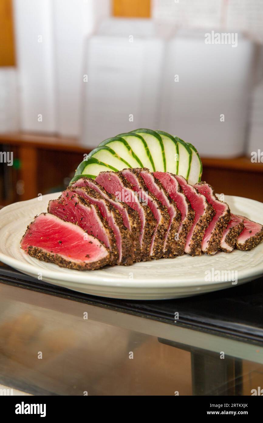 Black and White Tuna Sashimi plated and ready to be served Stock Photo ...
