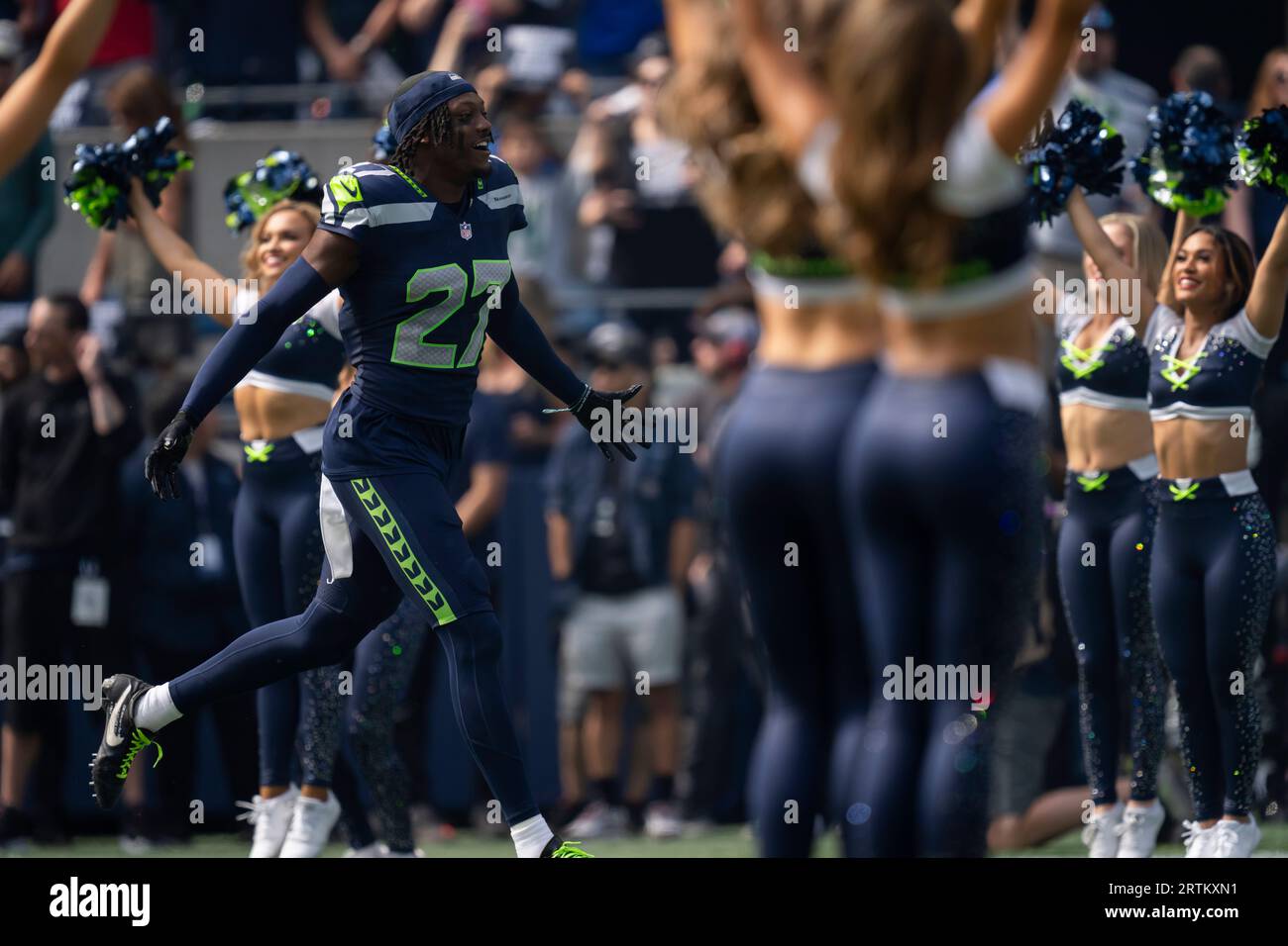 Seattle Seahawks cornerback Riq Woolen (27) runs out on to the field ...