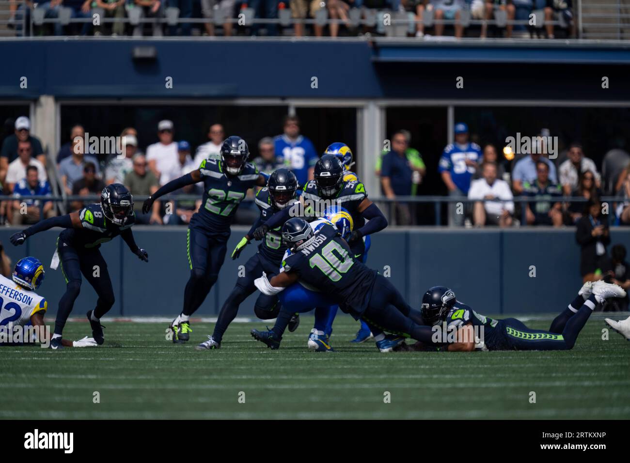Seattle Seahawks linebacker Uchenna Nwosu (10) makes a tackle during an ...