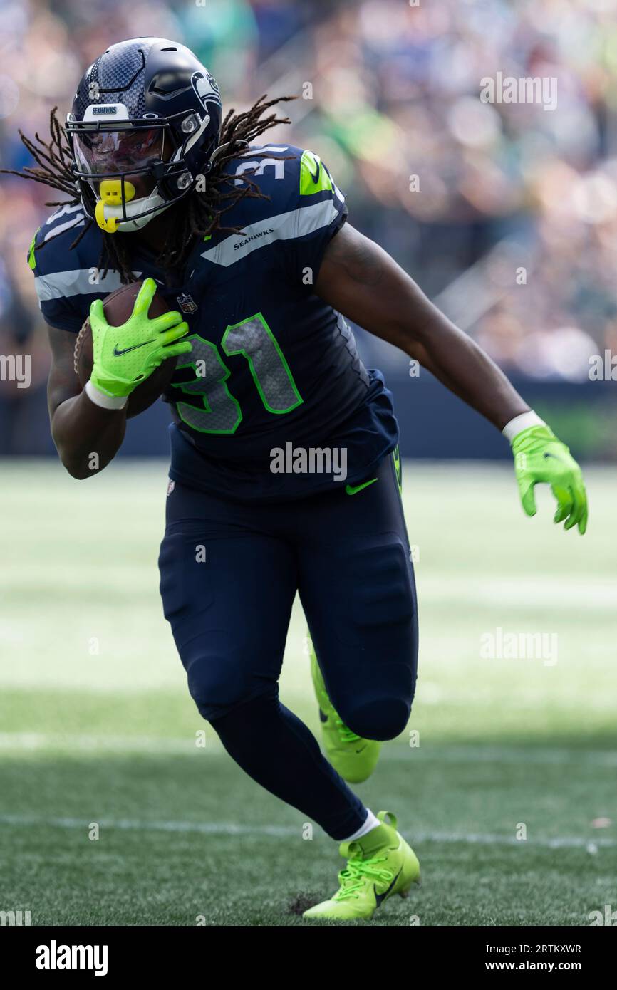 Seattle Seahawks running back DeeJay Dallas (31) runs with the ball ...