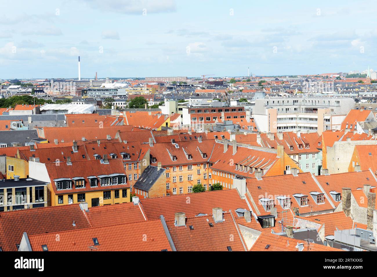 Red rooftops of the old buildings in the old town of Copenhagen seen ...