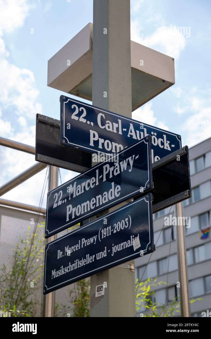 Signs on a pole with street names in Vienna International Center "Donau ...