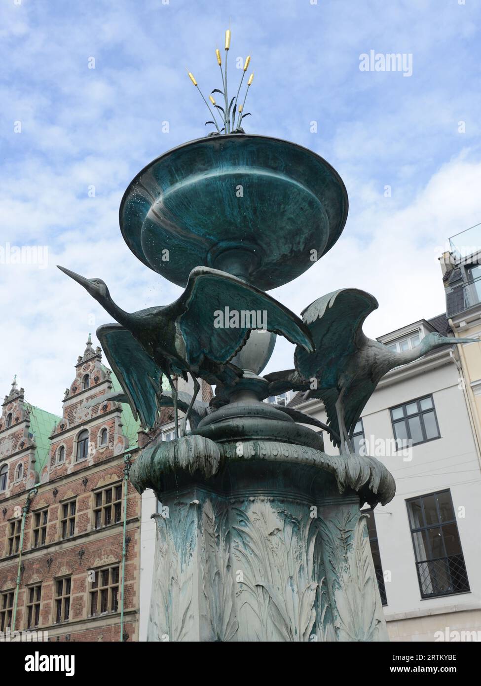 The Stork fountain is decorated with birds & frogs on Amagertorv ...