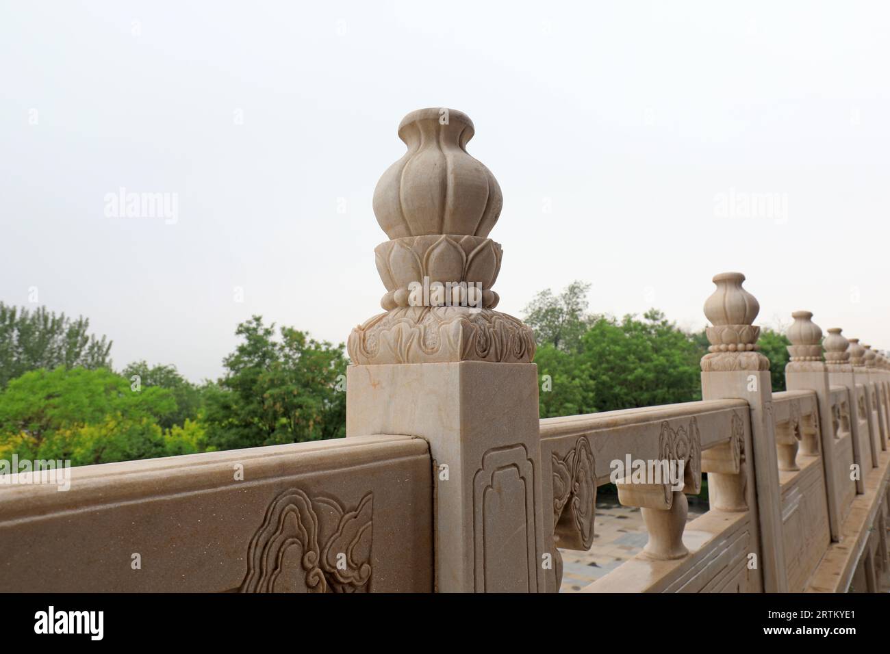 Rock railing sculpture in a park, North China Stock Photo - Alamy