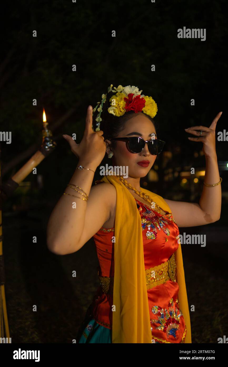 portrait of a traditional Javanese dancer dancing with very beautiful ...