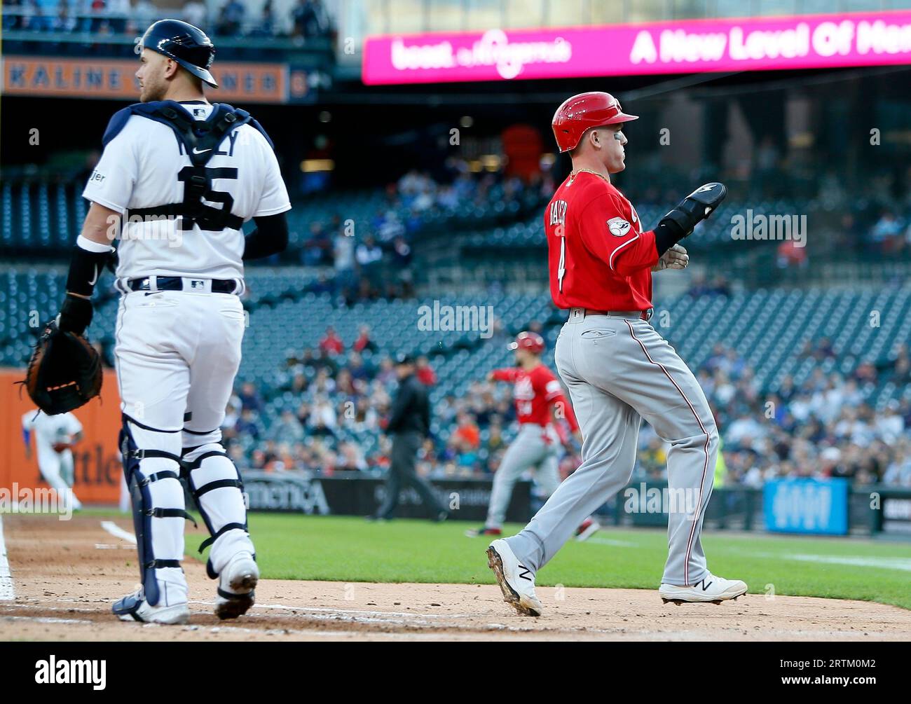 Cincinnati Reds' Harrison Bader (4) scores past Detroit Tigers catcher ...