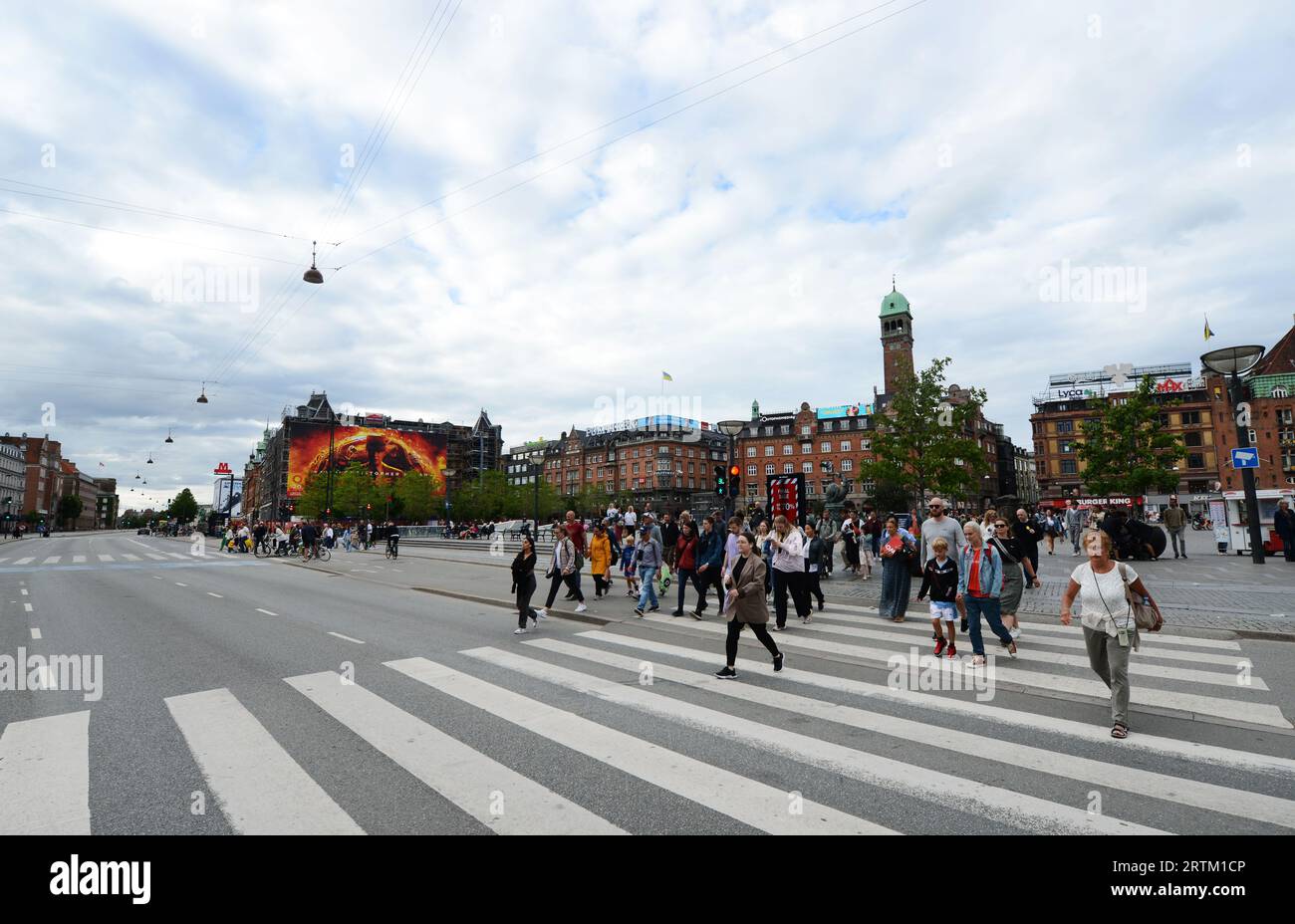 Pedestrians crossing the road by the City Hall Square in Copenhagen ...