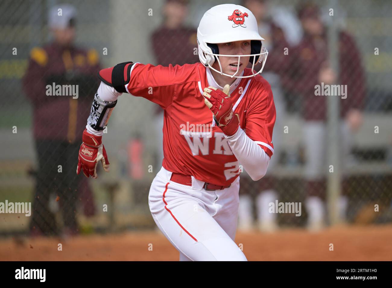 Western Kentucky's Addy Edgmon (20) runs after hitting a pitch during ...