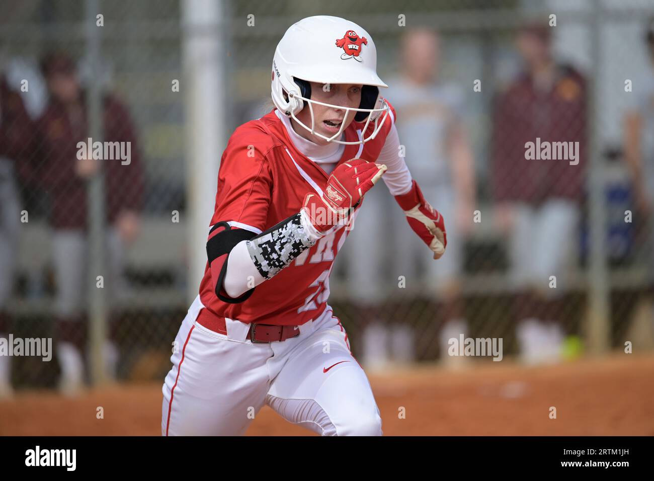 Western Kentucky's Addy Edgmon (20) runs after hitting a pitch during ...