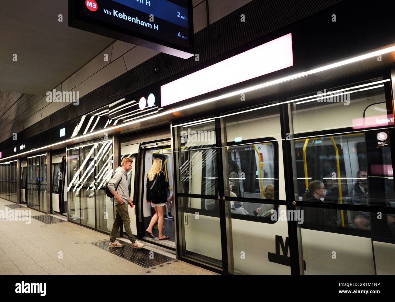 Traveling on the modern Metro system in Copenhagen, Denmark Stock Photo ...