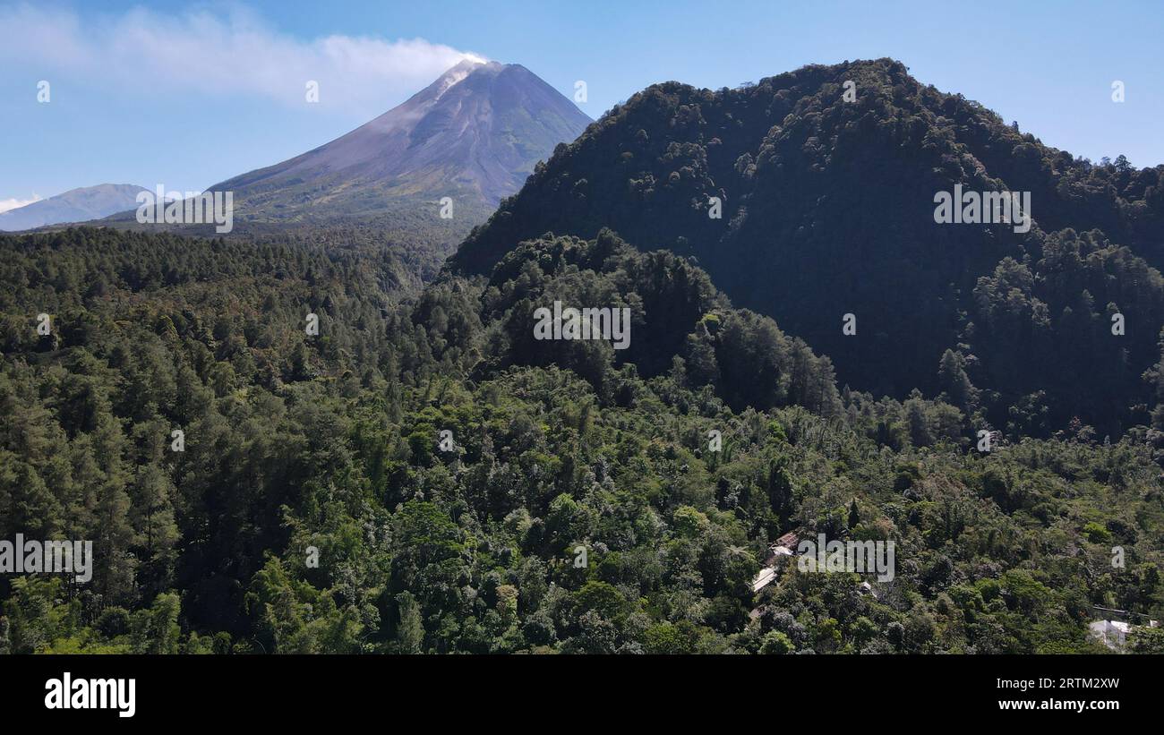 Beautiful view, Mount Merapi in the morning. The mountain emits smoke ...