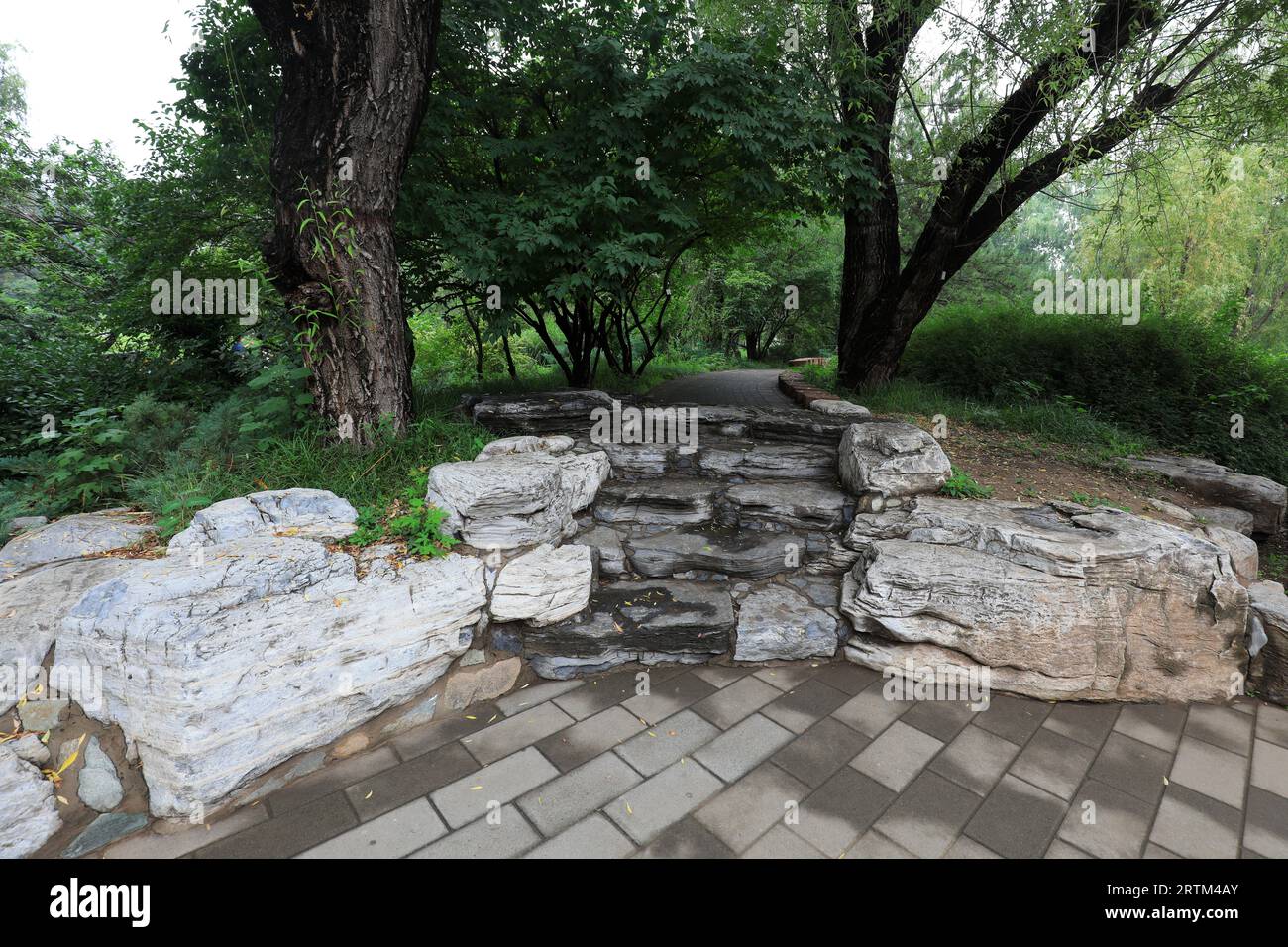 The rock path is in the park, Beijing Stock Photo - Alamy
