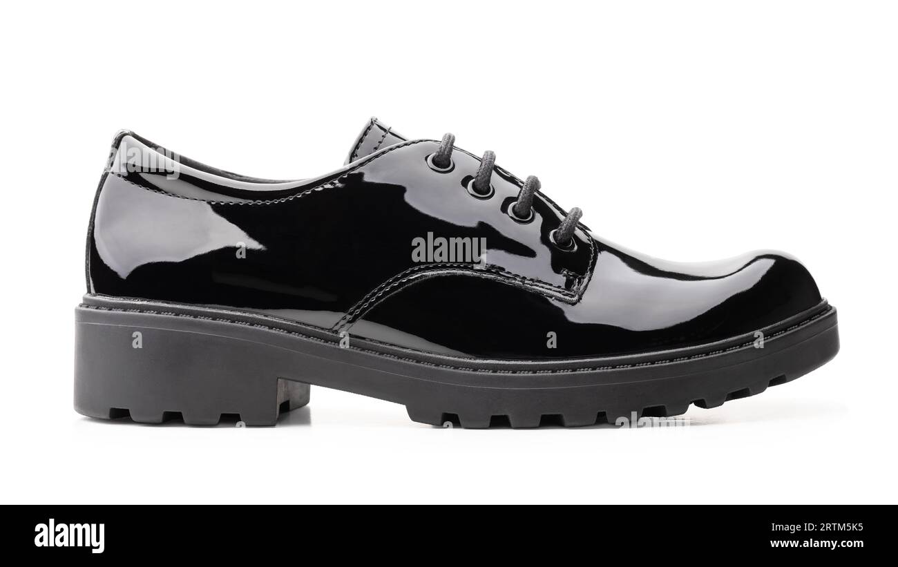 One leather patent leather boot in black color isolated on a white ...