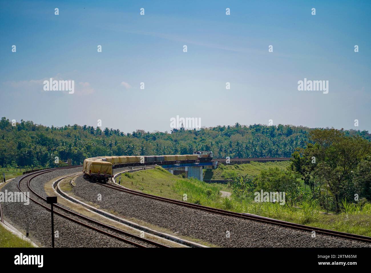 A freight train that passes through a 2-way line with a left and right ...