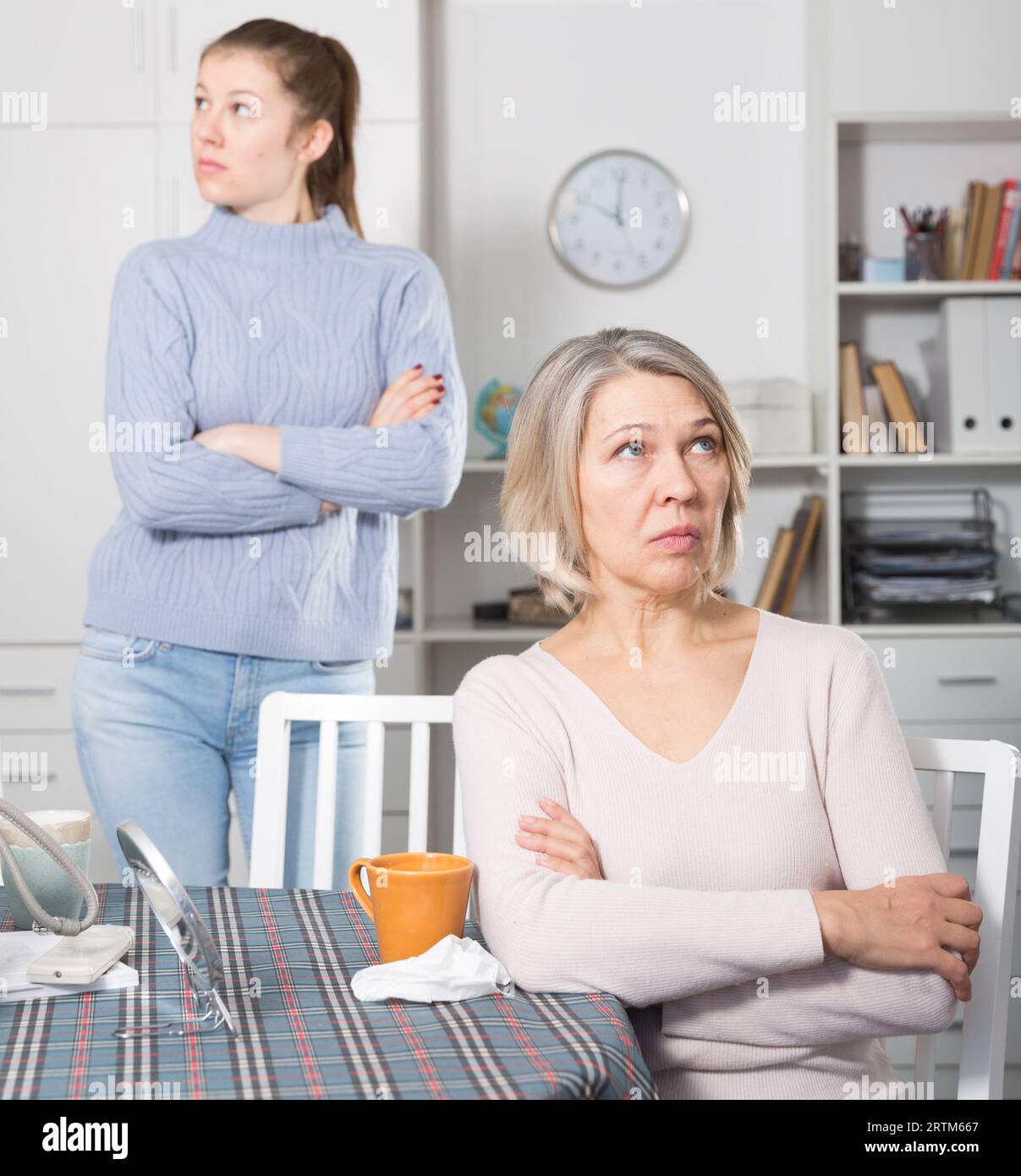 Silent resentment between mom and adult daughter Stock Photo - Alamy