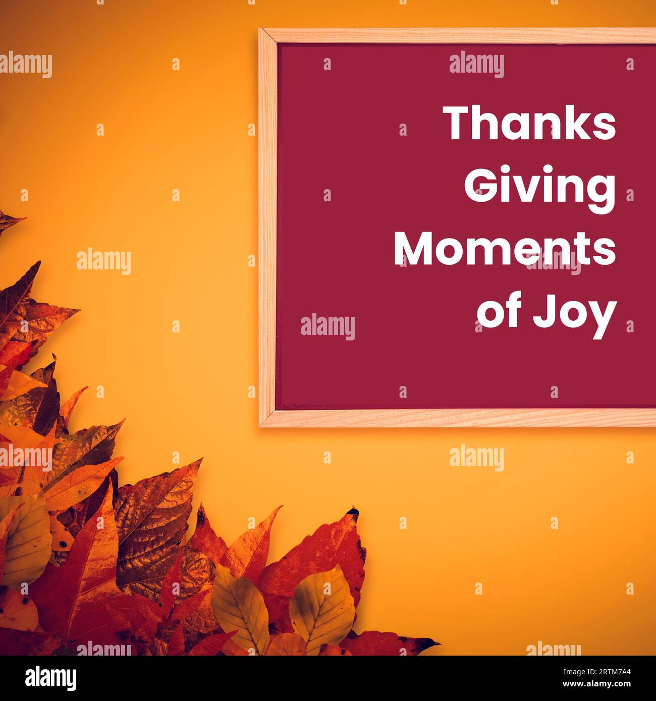 Thanks giving moments of joy text in frame with autumn leaves on yellow ...