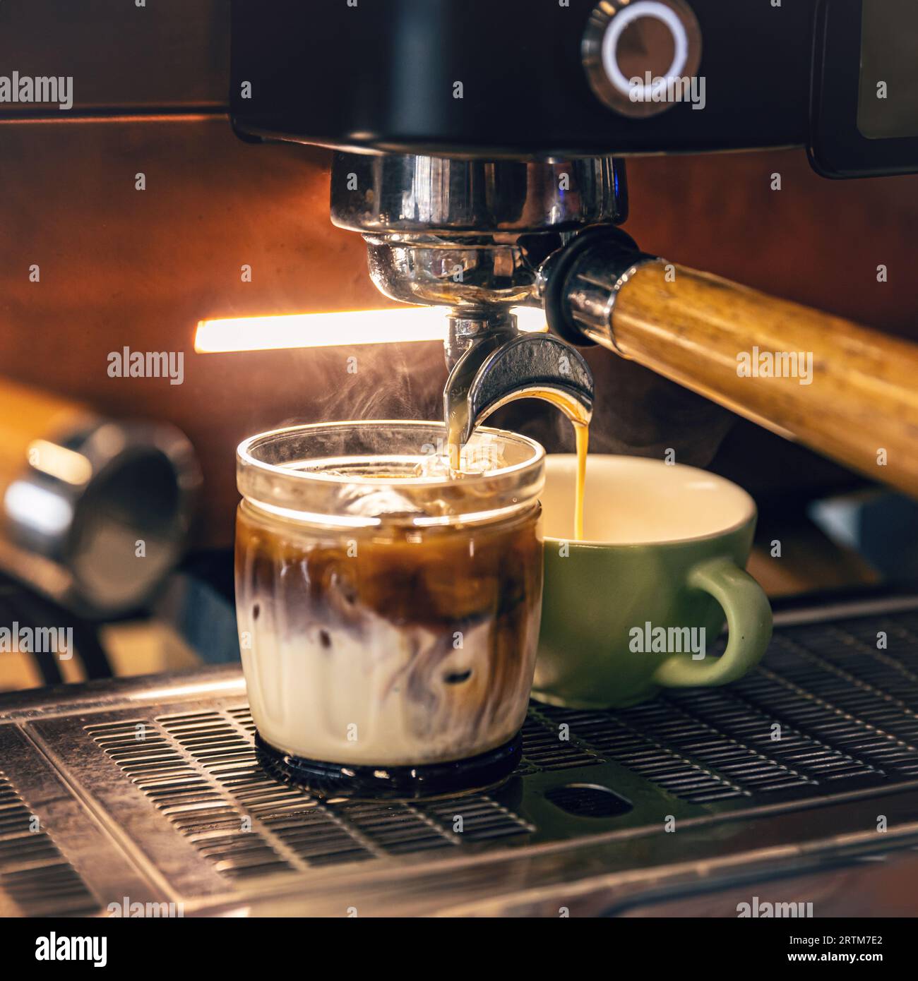 Coffee machine makes two different types of coffee Stock Photo - Alamy