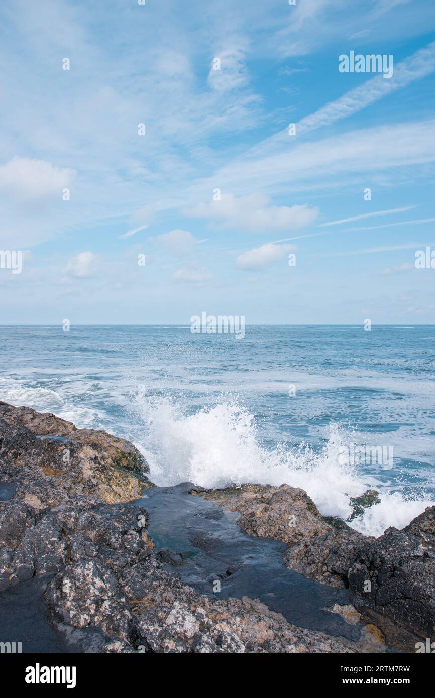 Waves crashing on the rocks at the beach in Wijk aan zee, Netherlands ...